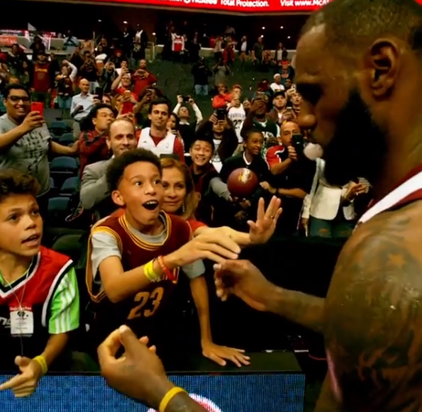 WATCH | Video captures sweet moment between LeBron James, young fans ...